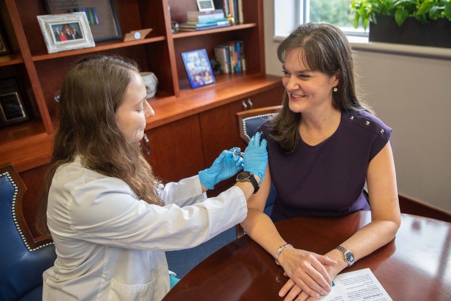 Pharmacy students give out 100,000th flu shot during American ...