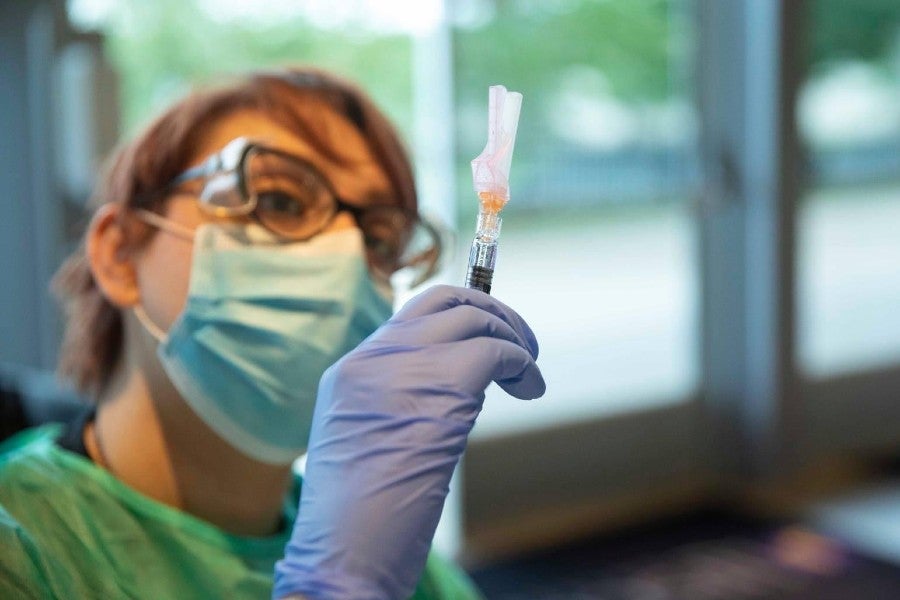 Pharmacy students give out 100,000th flu shot during American ...